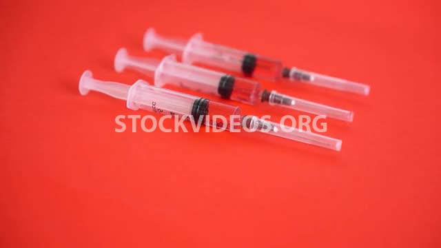 Hand picking up syringes, needle medication tablets research laboratory ...